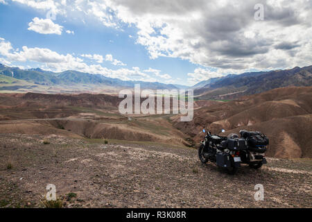 A sidecar motorcycle backed by a mountain range Stock Photo - Alamy