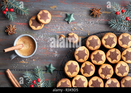 Christmas cookies with chocolate star pattern with cinnamon and anise ...
