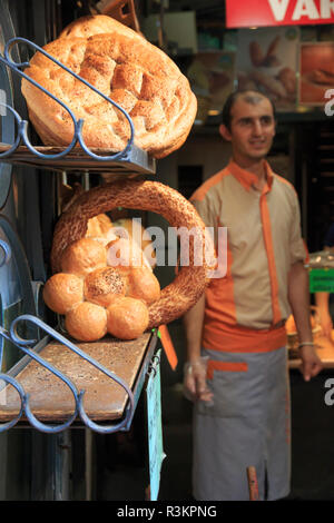 Turkey, Istanbul. Bakery, baker exhibits Pide, simit and other ...