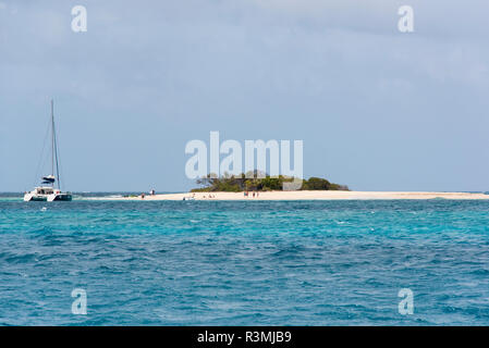 Islet of Sandy Spit, British Virgin Islands, with Tortola in the Stock ...