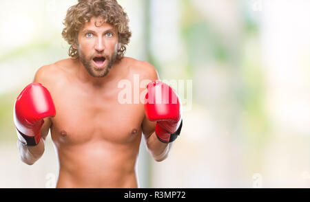 Scared angry boy with boxing gloves Stock Photo - Alamy