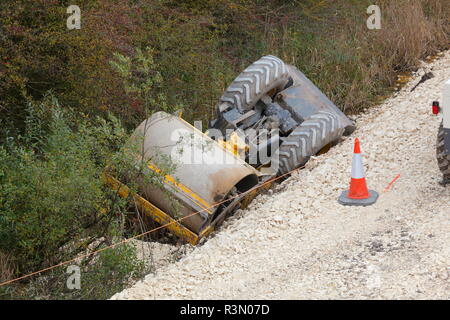 An overturned Bomag 213DH compaction roller on a construction site in Doncaster,South Yorkshire ...