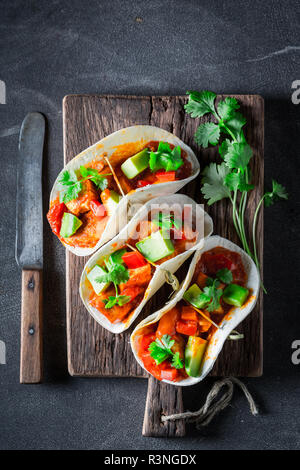 Top view of spicy tacos with fresh vegetables Stock Photo - Alamy