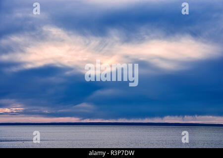 Canada, Nova Scotia, Fox Island. Sunset on rocky shoreline of ...