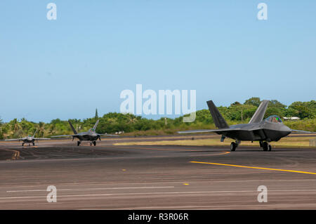 F-22 Raptors, operated by the 199th and 19th Fighter Squadrons, return ...