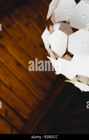 Geometric pieces of a ceiling lamp Stock Photo - Alamy