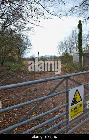 warning signs at entrance to quarry Stock Photo - Alamy