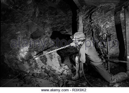 Underground coal miner with drill at coal face Stock Photo: 14823736 ...