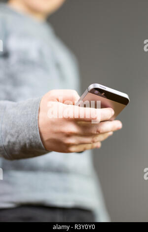 Boy using smart phone. Smartphone in hands. Community, social media ...