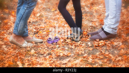 Beautiful young family. Bare feet of mother, father and daughter Stock ...