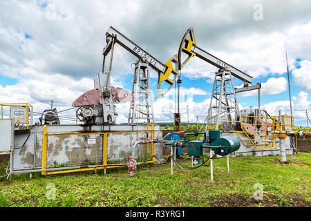 Nurlat, Russia - June 10, 2018: Working pump jack fracking crude ...