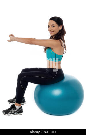 Merry beautiful woman. Work out in the gym. Woman smiling. Bike Stock ...