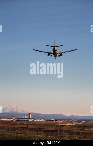 Portland, Oregon, USA. Commercial aircraft on final approach at PDX ...