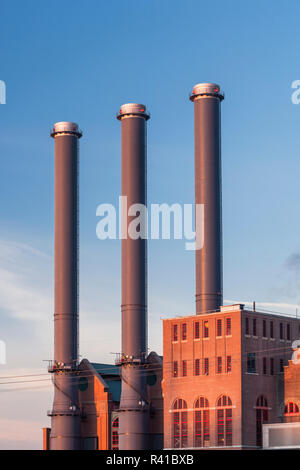 USA, Rhode Island, Providence, power plant smokestacks at dawn Stock ...