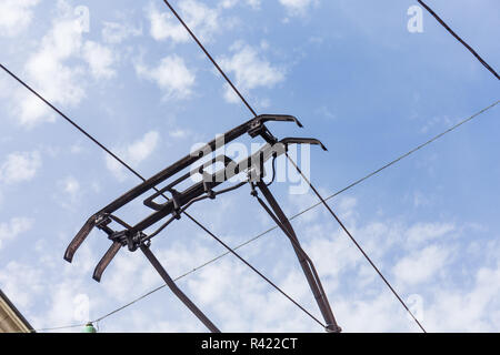 trolley trolleybus electricity cable construction on sky background ...