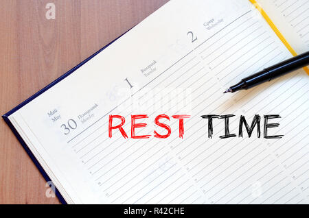 Rest time write on notebook Stock Photo - Alamy