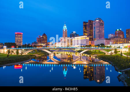 Columbus Ohio night exposure by Scioto River skyline skyscrapers in ...