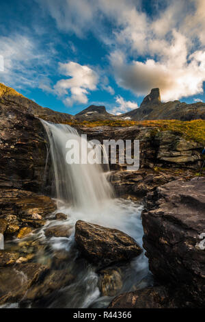 A natural view of a beautiful waterfall in a forest Stock Photo - Alamy