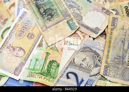 International currency with banknotes from different world countries ...