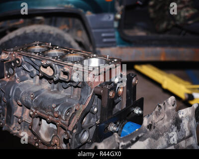 Disassembled car engine block at car service station Stock Photo - Alamy