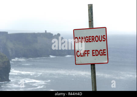 Warning sign at the Cliffs of Moher in County Clare Ireland Stock Photo ...