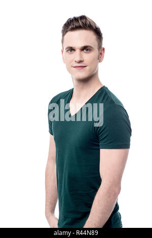Photo of charming pretty young guy wear casual clothes arms head ...
