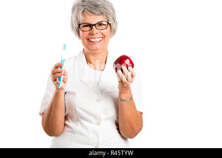 grandma brushing her teeth with a brush Stock Photo - Alamy