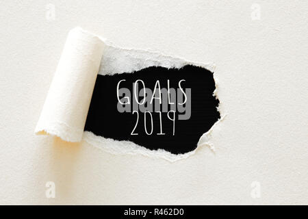 2019 goals list written over torn paper on black background Stock Photo ...