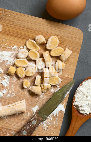 Raw homemade Hungarian Csipetke soup pasta or noodle, made of flour ...