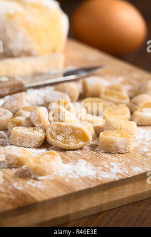 Raw homemade Hungarian Csipetke soup pasta or noodle, made of flour ...