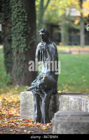 Statue of Pan playing his flute. Pan is the Greek god of the wild ...