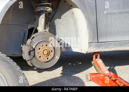 a front Disk brake assembly on a modern car Stock Photo - Alamy