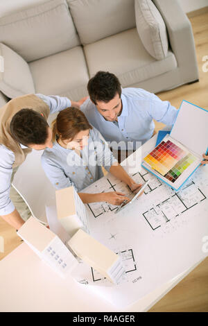 Upper view of architects working in office Stock Photo - Alamy