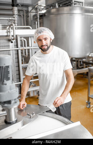 Interior of cheese factory with fermentation tank. Technology equipment ...