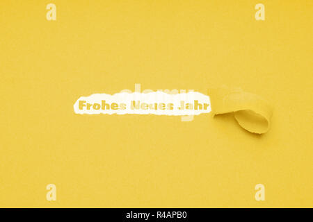 Frohes neues Jahr means happy new year in German - text seen through ...