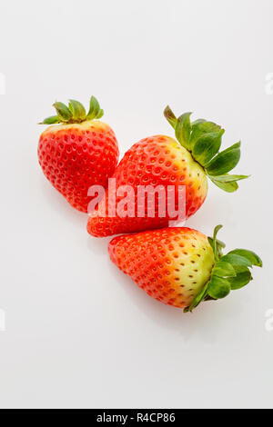 Closeup of not fully ripe strawberries Stock Photo - Alamy