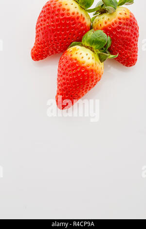 Closeup of not fully ripe strawberries Stock Photo - Alamy