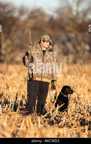 A duck hunter and his hunting dog in Kansas Stock Photo - Alamy