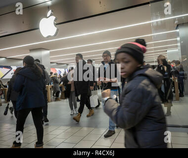 An Apple store in the Queens Center Mall in New York on Friday, April 8 ...