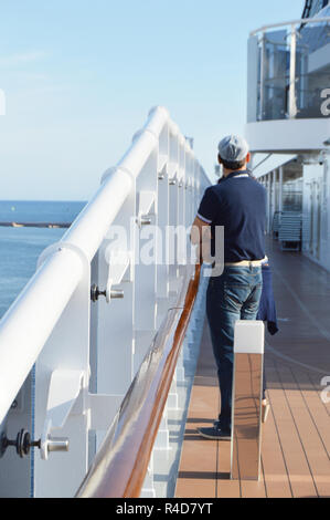 girl standing at ship deck and looking into the distance view from ...