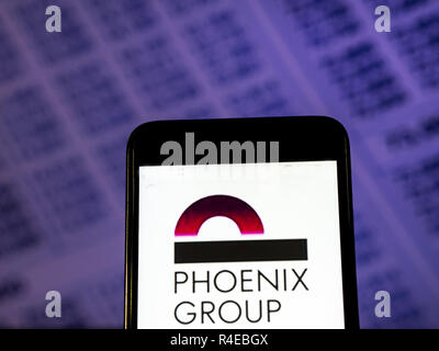 Phoenix Group Insurance company logo seen displayed on smart phone ...