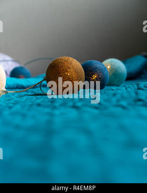 Christmas Decoration Light Balls Laying on Mattress with Turquoise ...