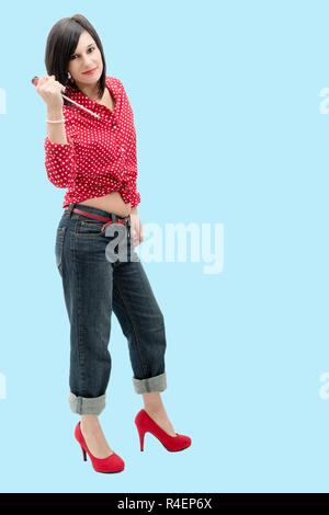 pretty young woman holding screwdriver Stock Photo - Alamy
