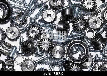 Background with mechanical components, gears, springs, screws ...