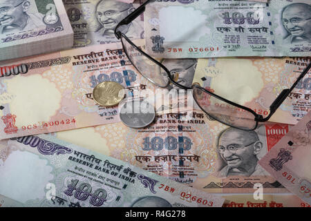 Indian money with spectacles Stock Photo - Alamy