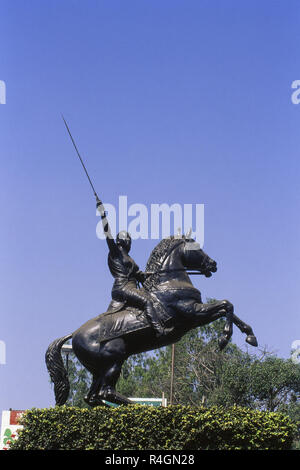 Statue of Tara Rani against blue sky, Kolhapur, Maharashtra, India ...