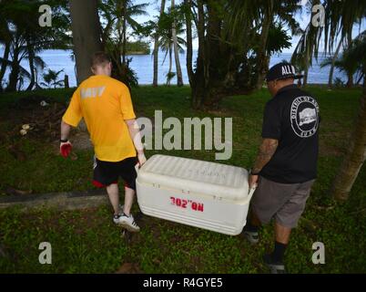 Aviation Ordnanceman 2nd Class (AO2) Robert McGill, left, AO2 John ...