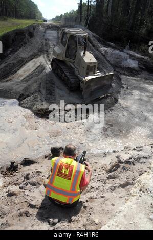 US Army Corps of Engineers, Omaha District members inspect the ...