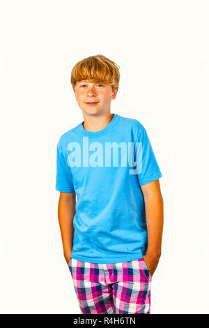 cute bold faced boy with white wall background Stock Photo - Alamy