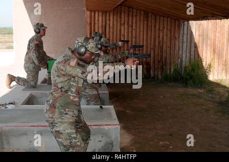 US Army Soldiers from NRDC Spain fire an M9 9mm pistol during ...